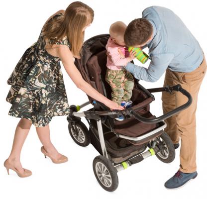 Parents Put A Child In A Pram