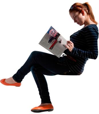 Sitting Woman With Magazine