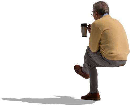 Man Sitting With Cup
