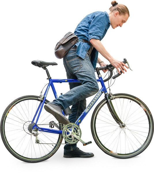 A White Man Getting On A Bicycle
