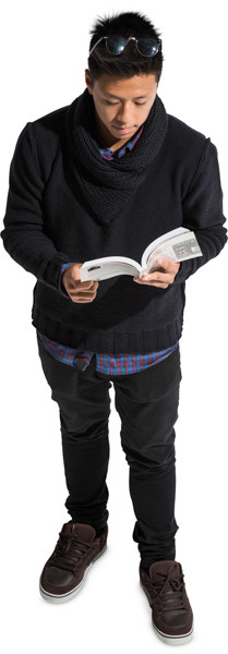 Standing Boy Reading A Book